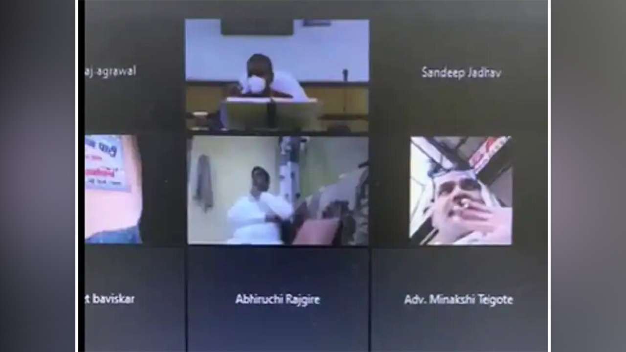 Congress Corporator Smoking Cigarette In Municipal Corporation Meeting